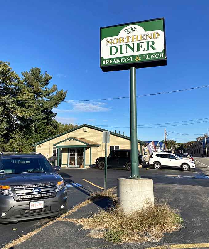 That sign beckons hungry travelers like a lighthouse guides ships, promising breakfast salvation for the famished masses.