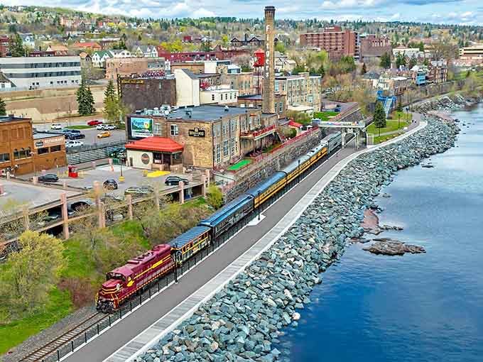 From above, the train hugs Duluth's shoreline like it's afraid to leave, and honestly, who could blame it?