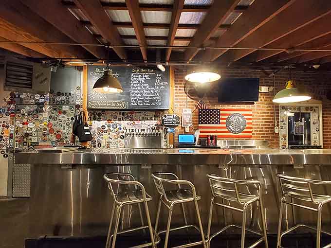 The basement bar area offers a cozy, intimate vibe perfect for serious beer conversations and casual good times.