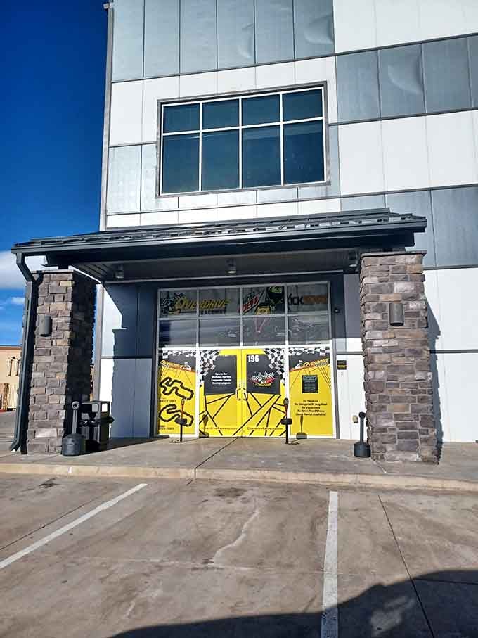 Bold yellow graphics announce you've arrived at Colorado Springs' premier destination for controlled chaos.