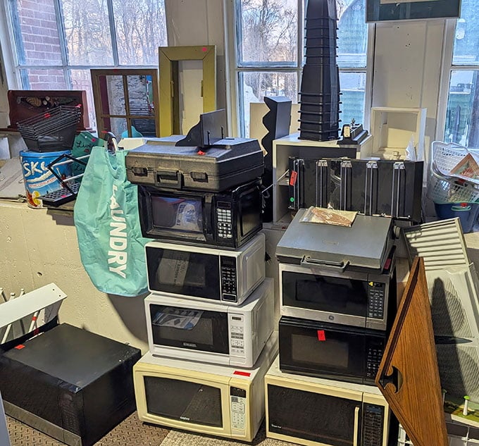 A tower of microwaves proves that even the most mundane appliances deserve a second chance at life.