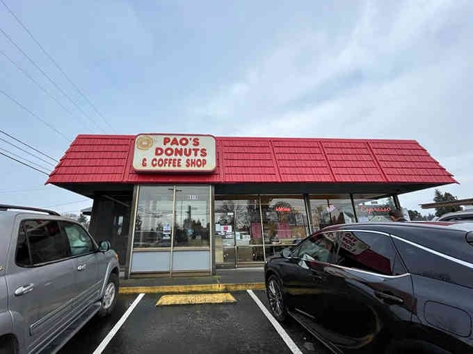 The parking area knows where neighbors become friends over coffee and conversation about maple bars.