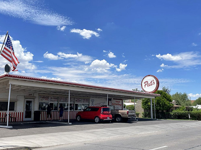 The whole package: vintage charm, that iconic sign, and the promise of the best chili dogs you'll ever taste.