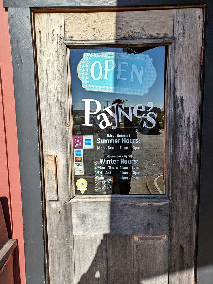That weathered door with the cheerful "OPEN" sign is your gateway to Gas City's best-kept culinary secret.