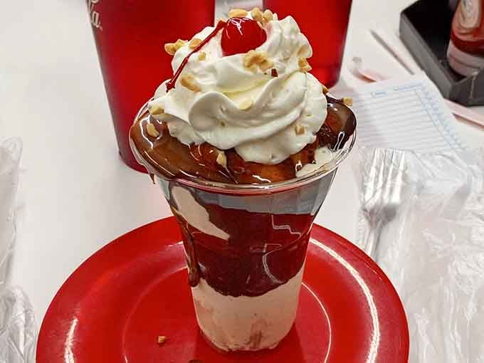 This sundae towers with layers of ice cream, sauce, and toppings that defy gravity and common sense beautifully.