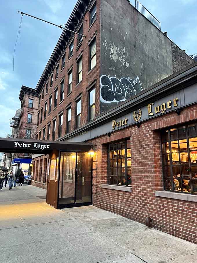 The corner location glows invitingly at dusk, calling to hungry souls who understand what truly great steak tastes like.