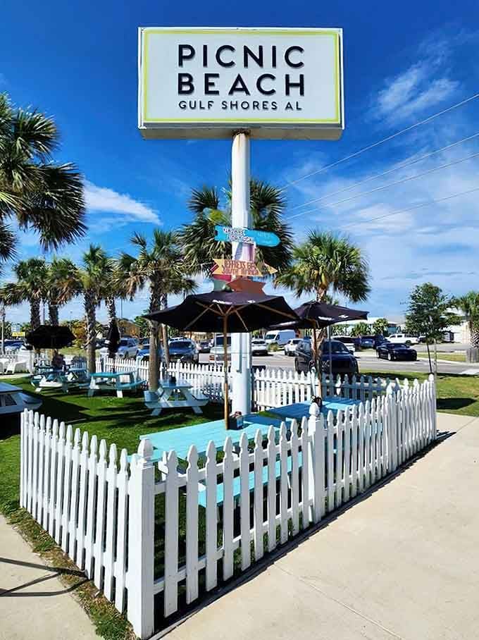 The roadside sign that beckons travelers like a lighthouse guides ships, promising good food and better times ahead.