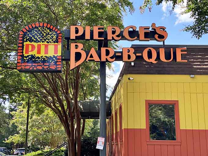 Bold signage announces what locals have known for decades: serious barbecue happens here, no apologies needed.