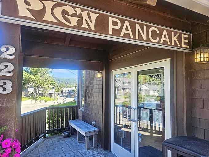 The entrance beckons with mountain views in the distance, promising that what awaits inside is worth every step through those doors.