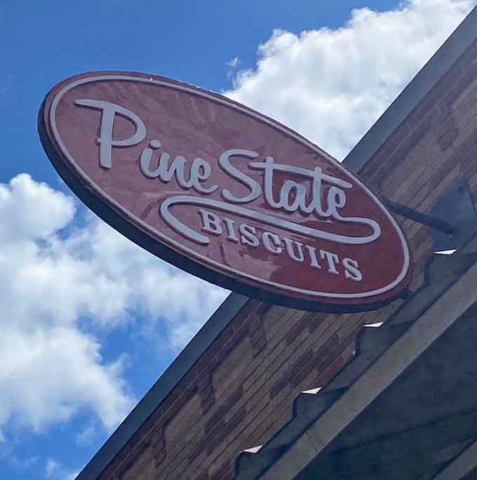 The iconic sign beckoning biscuit lovers like a lighthouse guides ships, except here the treasure is flaky carbs.