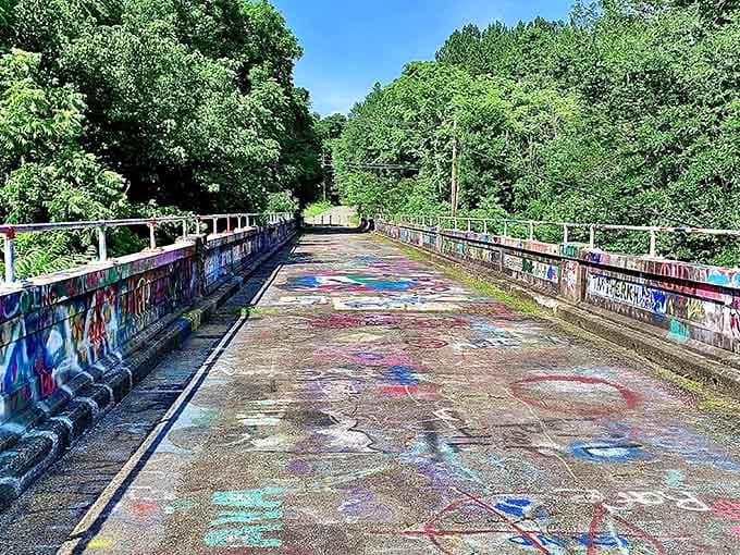 Old Bynum Walking Bridge offers colorful graffiti art over peaceful waters, blending rebellion with natural beauty perfectly.