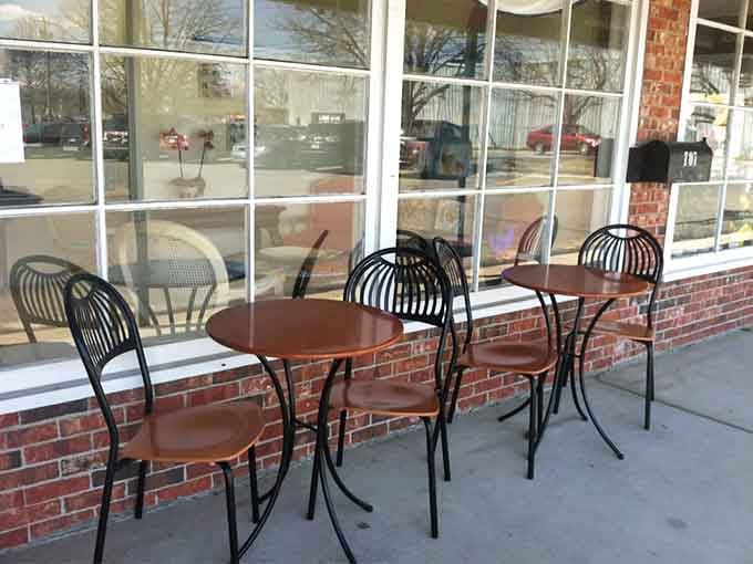 Outdoor seating where you can enjoy your pastry while watching the world go by, coffee in hand.