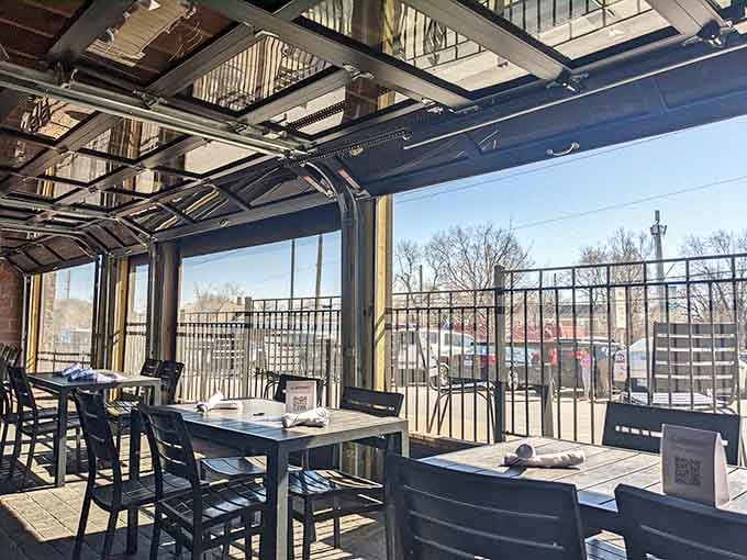 The patio offers fresh air and barbecue, proving that outdoor dining can involve serious smoke and flavor.