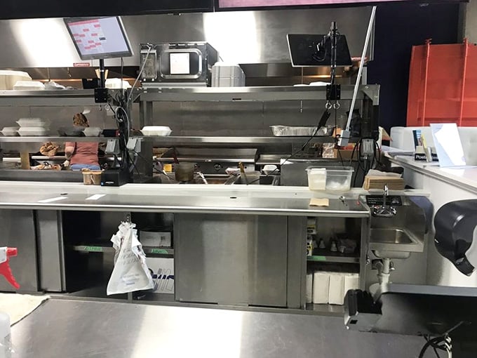The kitchen where all the magic happens, clean and organized like a well-orchestrated culinary command center.