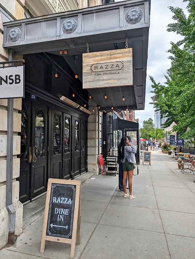 That simple wooden sign hanging outside marks the entrance to what many consider New Jersey's finest pizza destination.