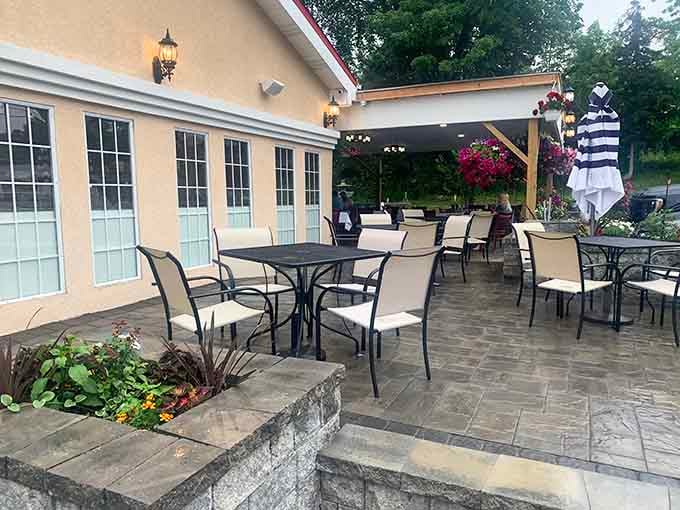 The outdoor patio offers al fresco dining perfection during Connecticut's precious warm weather months when stars align beautifully overhead.