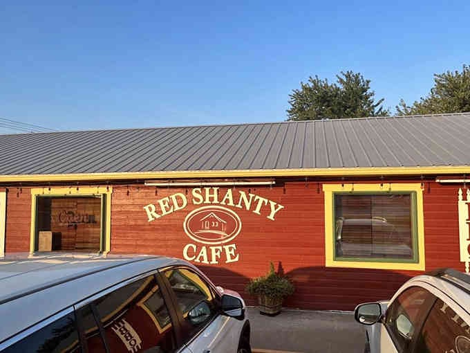 The red building against a blue sky is a reminder that sometimes the best destinations are the ones you almost drove past.