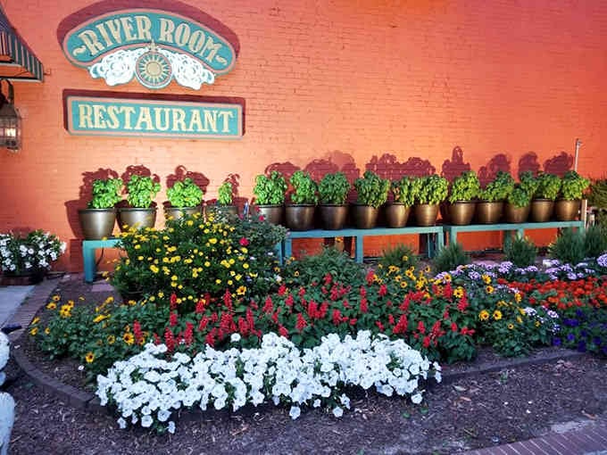 Bright flowers greet you at the entrance because even before the food, this place wants you to feel welcome.