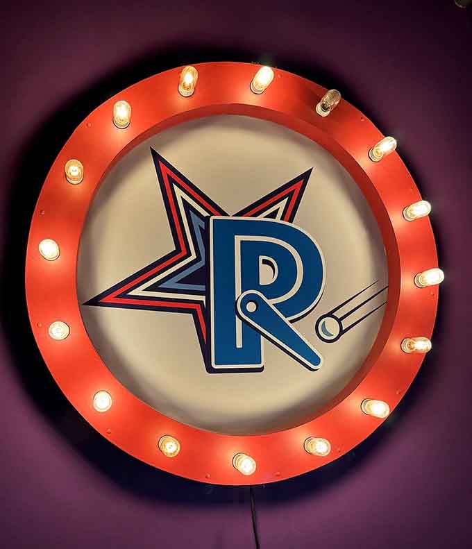 The glowing museum logo beckons like a lighthouse guiding weary souls back to simpler, flipper-filled times.