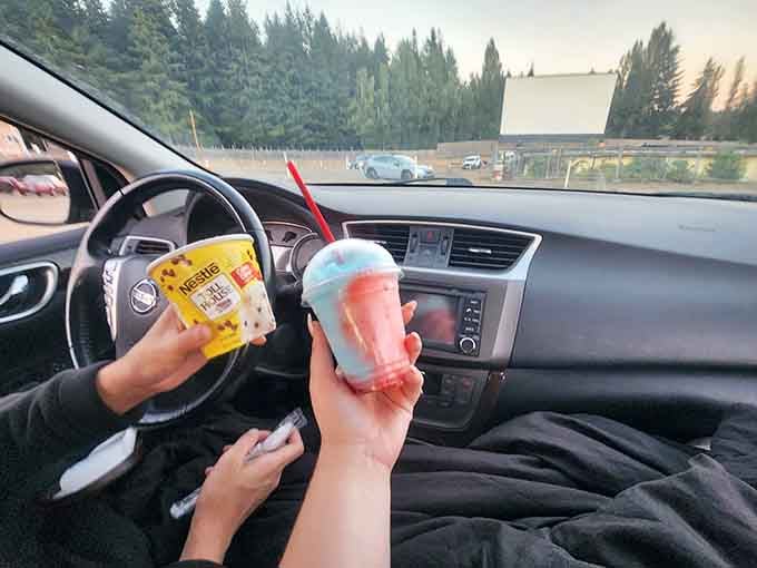 Movie snacks taste exponentially better when consumed in your own car wearing whatever you want.