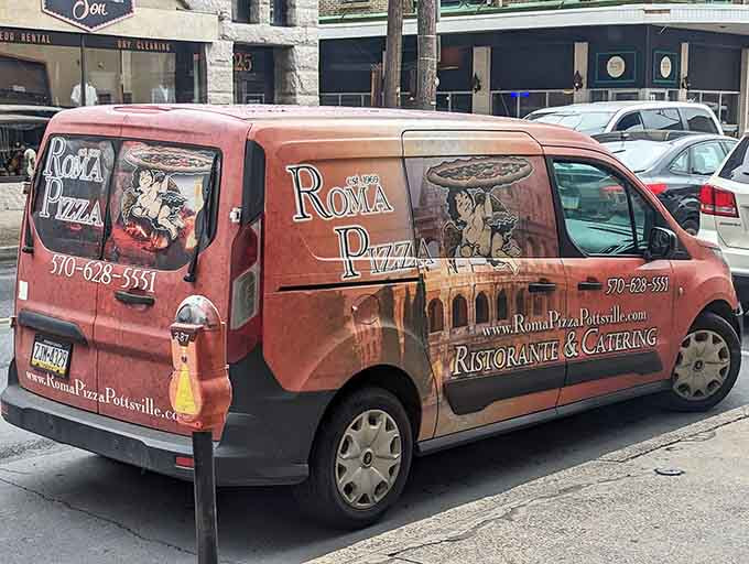 Even their delivery vehicle looks ready to bring joy, one pizza box at a time, across Pottsville.