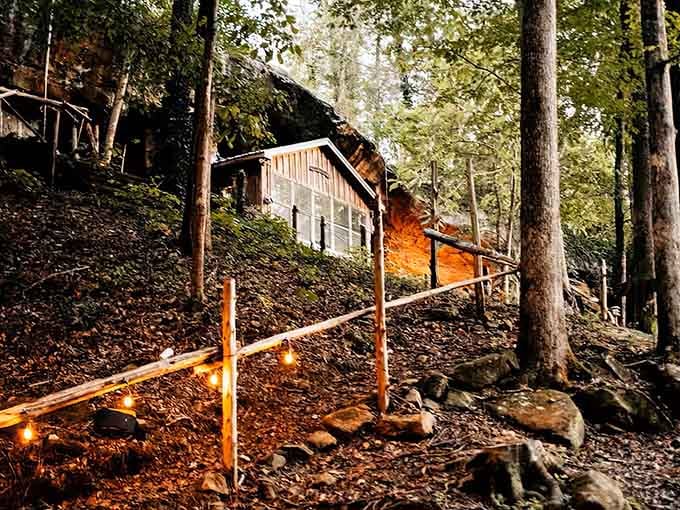 The approach to your cave cabin, where "roughing it" means having to choose between the hot tub or lake.