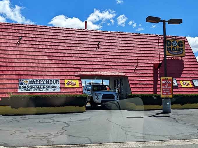 Even the drive-through window embraces the dog house theme, because commitment to a concept matters here always.