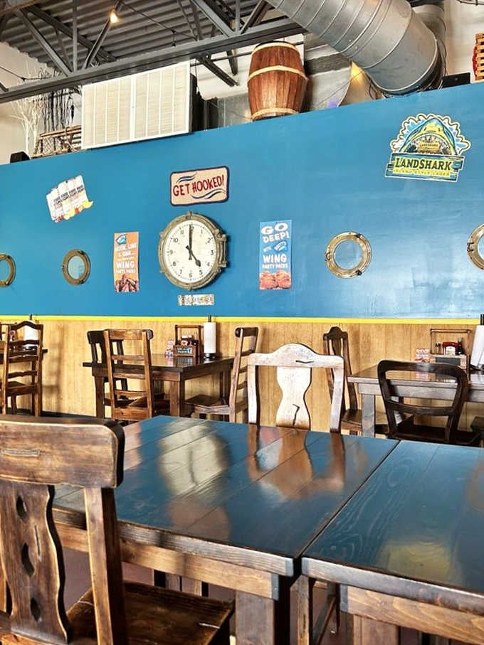 Another angle of this happy place where blue accents complement yellow walls and good food brings the community together.