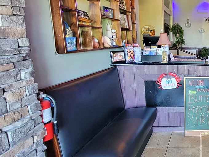 The waiting area features thoughtful touches that make those few minutes before your table feel less like waiting, more like anticipating.