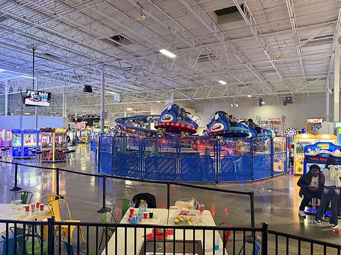 Carnival rides spin overhead in brilliant colors, bringing boardwalk excitement indoors where weather can't rain on anyone's parade.
