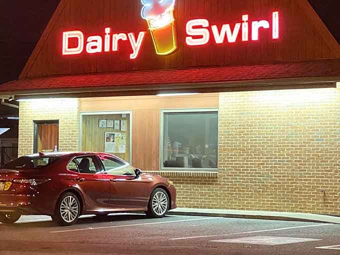 The glowing Dairy Swirl sign at night is basically a bat signal for anyone craving soft serve ice cream.