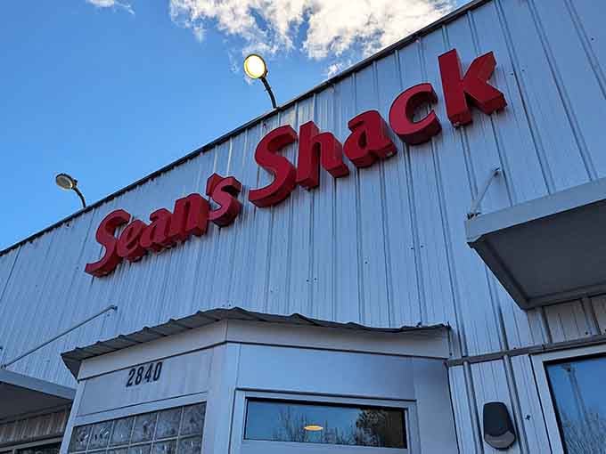 That bold red signage serves as a beacon of hope for anyone tired of overpriced meals and underwhelming portions at trendy spots.