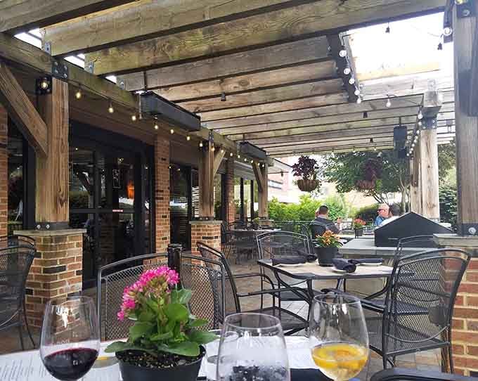 The patio offers al fresco dining under string lights, because everything tastes better when eaten outside with good company.