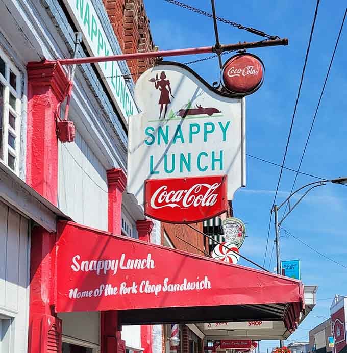 Vintage Coca-Cola signs and classic lettering announce you've arrived at something special worth remembering forever.