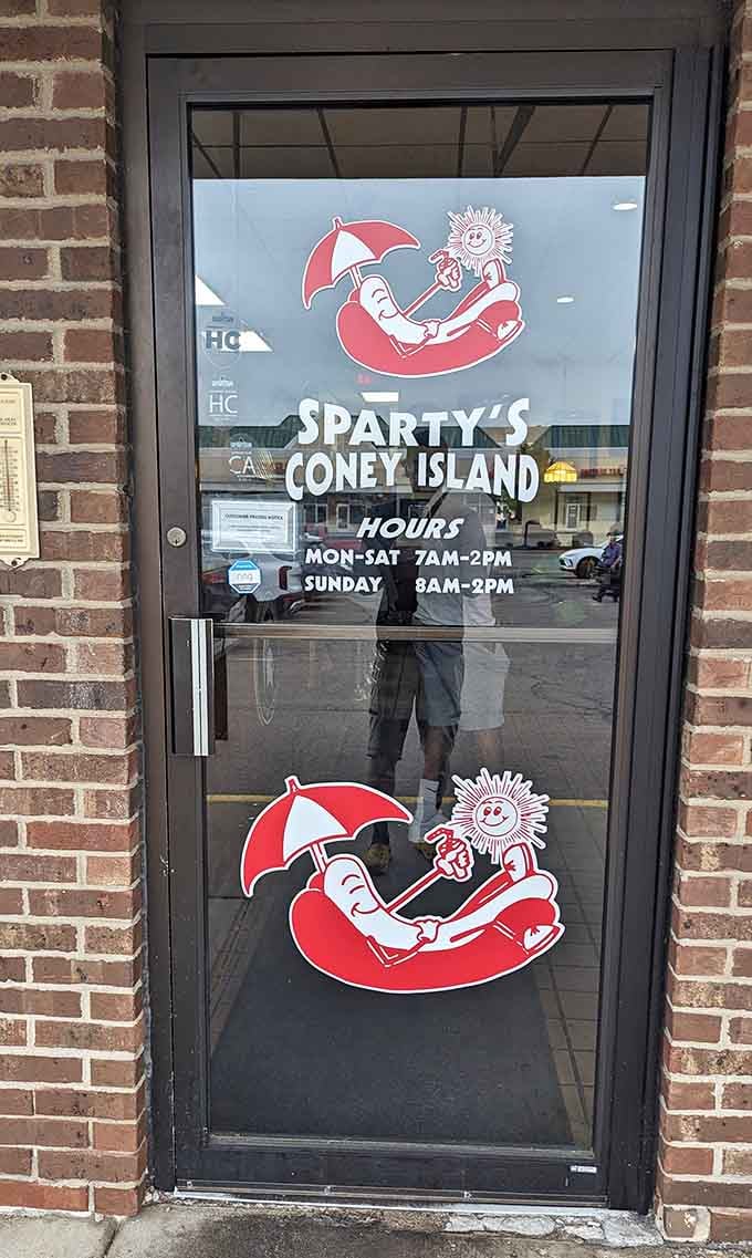 That cheerful door decal welcomes you to coney dog paradise&mdash;your taste buds' favorite destination in Lansing.