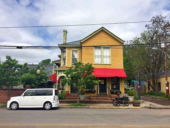 From across the street, Stella's looks like a postcard from a friendlier era when houses became gathering places for good food.