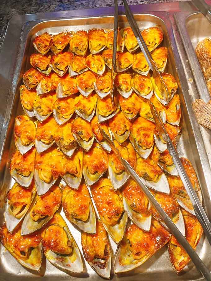 Baked mussels with melted cheese create that perfect combination of seafood sophistication and comfort food indulgence today.