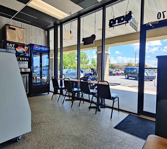 Window-side tables offer natural light and people-watching opportunities while you devour your burger and fries.