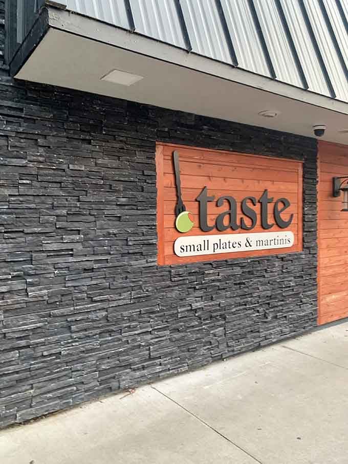 Simple, bold signage that tells you exactly what you're getting: small plates, martinis, and a whole lot of flavor.