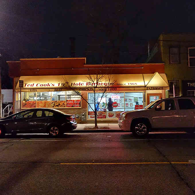 That corner location glowing at night looks like the North Star for anyone seeking authentic barbecue perfection.