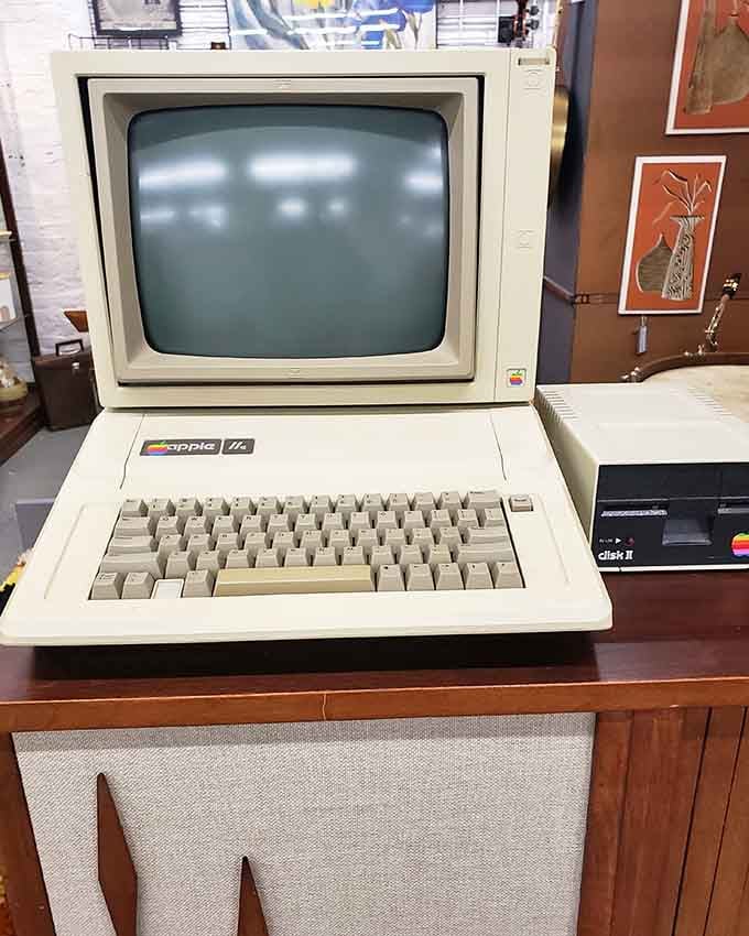 An Apple IIe computer sits as a monument to when "cutting edge" meant beige plastic and floppy disks.