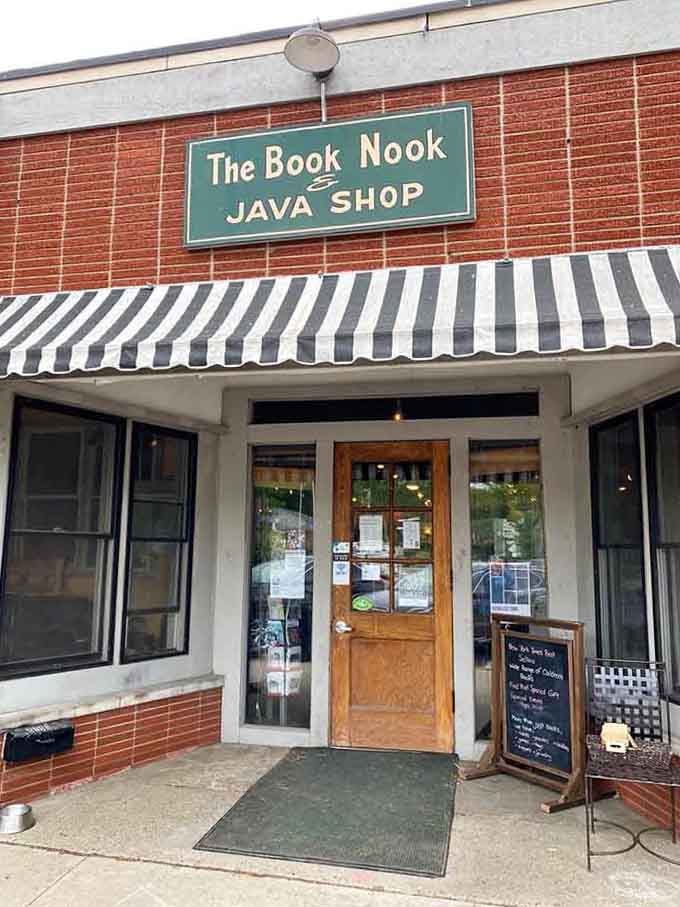 That welcoming wooden door opens to a world where pages turn, coffee brews, and time slows delightfully down.