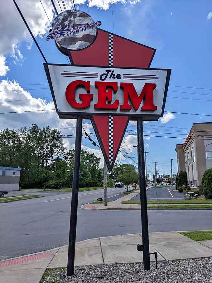 That towering vintage sign announces The Gem Diner like a beacon calling all breakfast lovers home.