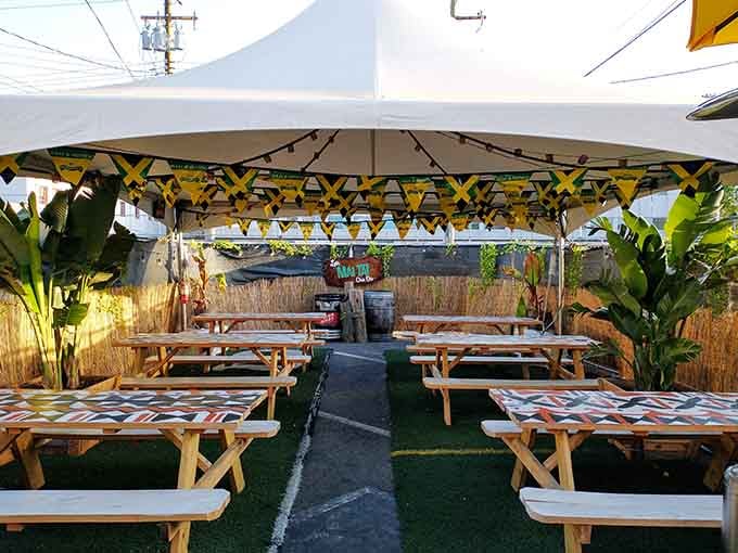 The outdoor patio brings California sunshine to your tiki experience, complete with festive bunting and tropical plants.