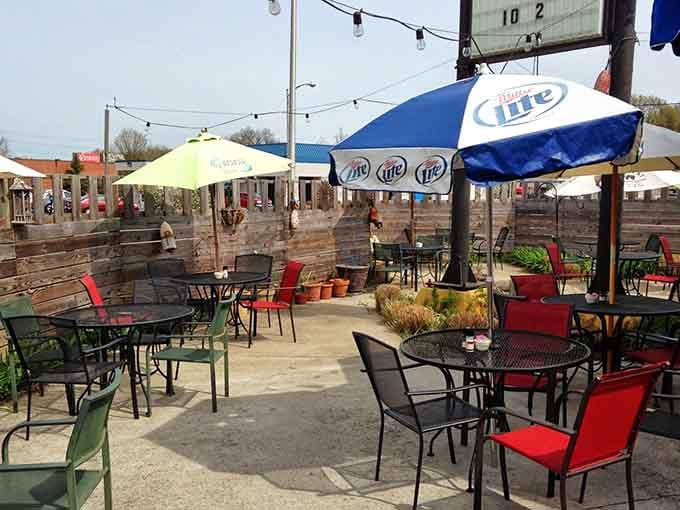 String lights and umbrella-shaded tables transform this patio into your favorite coastal escape, minus the actual coast nearby.