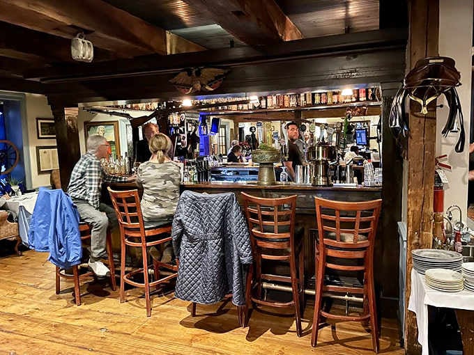The bar where locals and visitors alike gather, continuing a tradition of hospitality that's literally older than America.