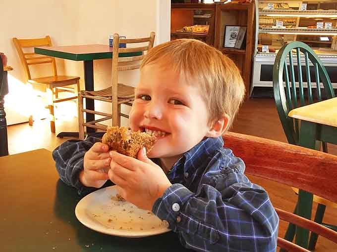 Pure joy captured in one bite, proving that great pie transcends all age barriers completely.