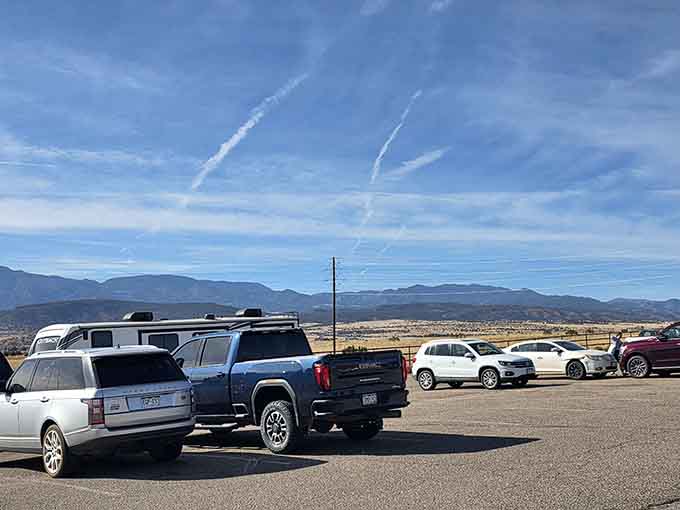 Mountain views frame the parking area, reminding you that great meals taste even better with Colorado scenery included.