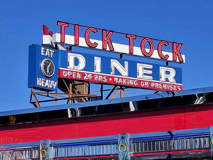 The iconic neon sign glows like a North Star, guiding travelers to their delicious destination day or night.