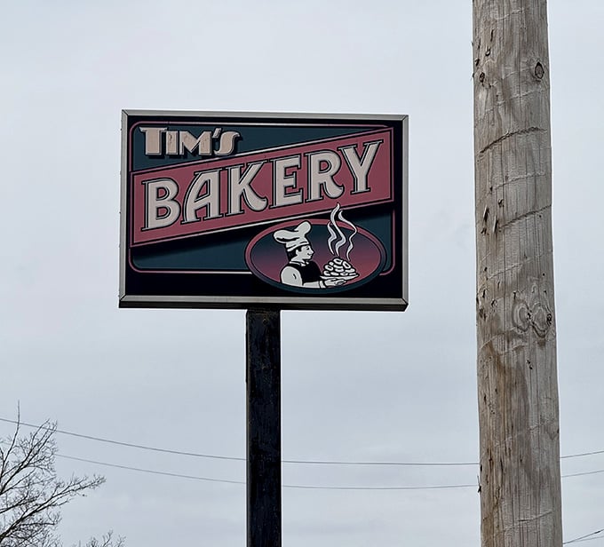 The sign featuring a cheerful baker promises good things await&mdash;truth in advertising at its finest, folks.